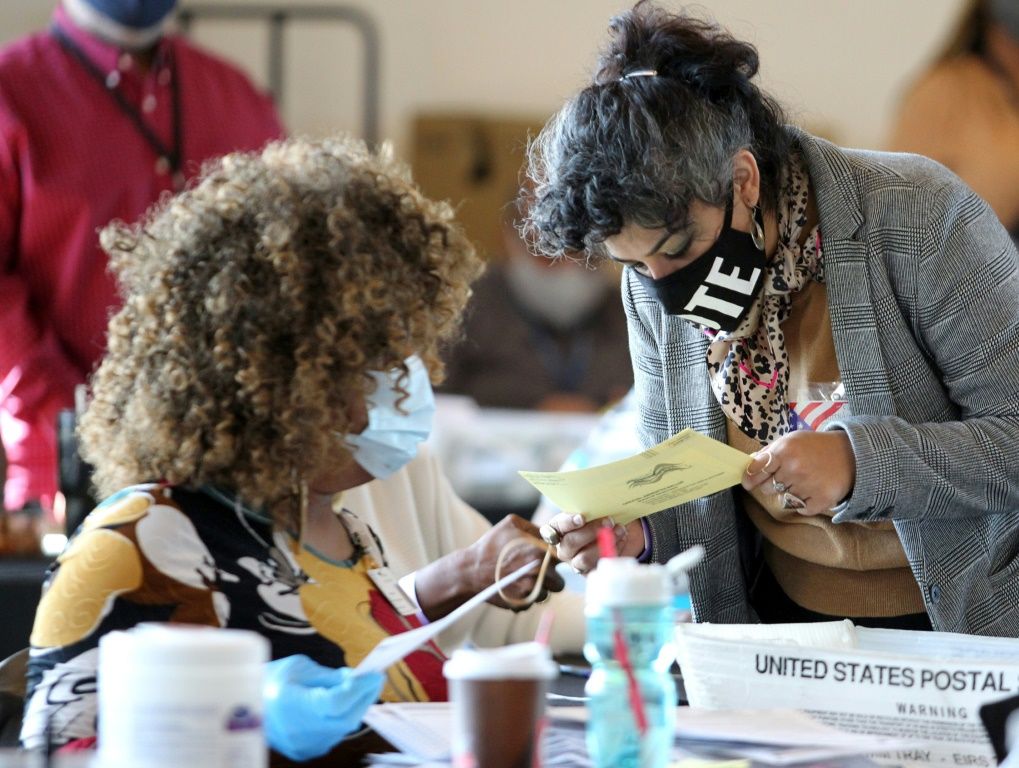 Gloved And Masked, US Vote Counters Keep Focused On Historic Task